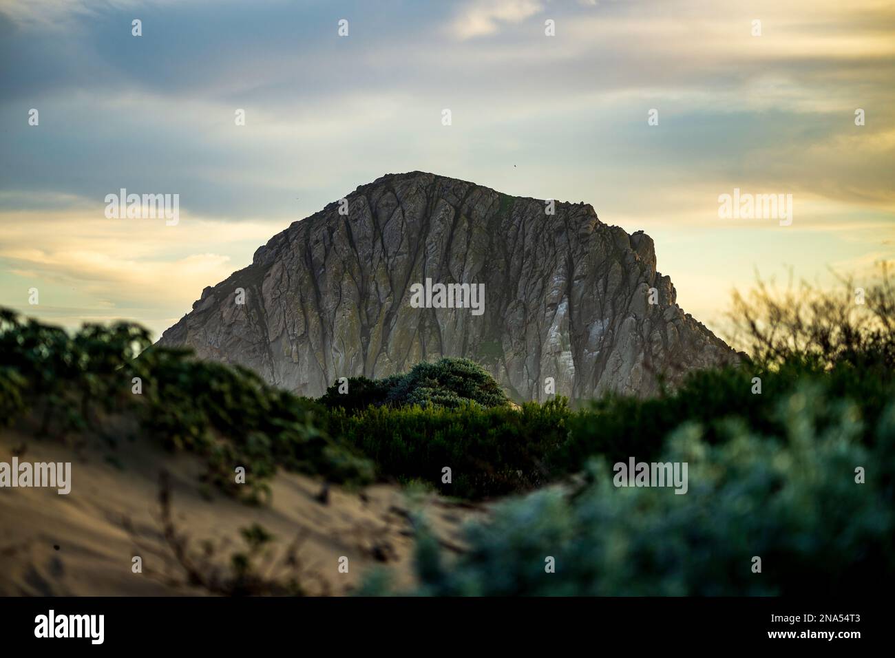 Morro Rock as the sun sets at Morro Bay, California Stock Photo - Alamy