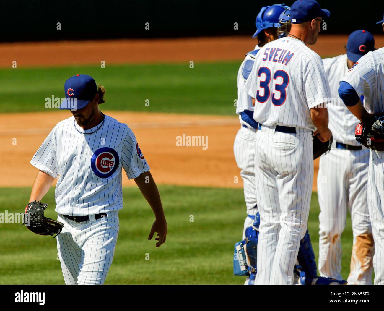 Chicago Cubs pitcher Travis Wood leaves the game in the fourth inning ...
