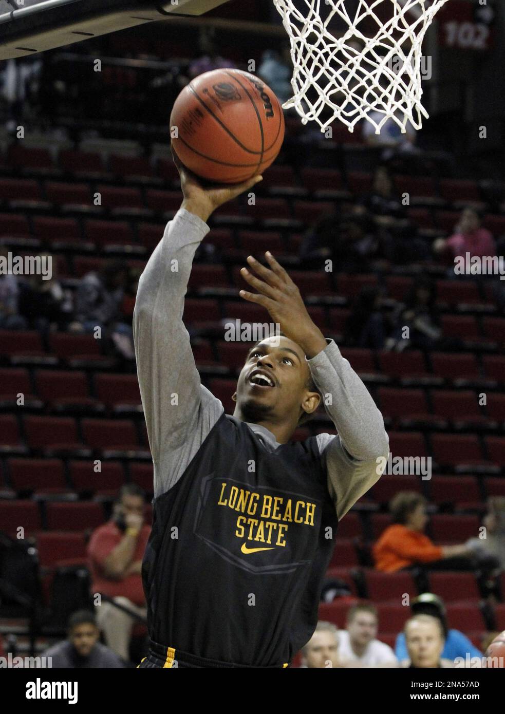 Long Beach State guard Casper Ware shoots during basketball practice in ...