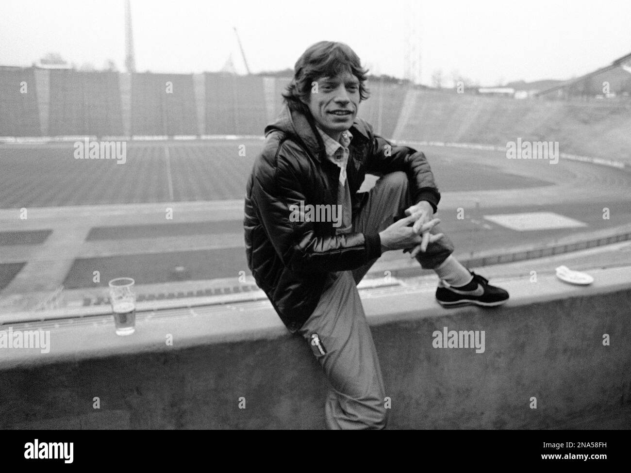 Mick Jagger from The Rolling Stones poses during a visit to the Olympic ...