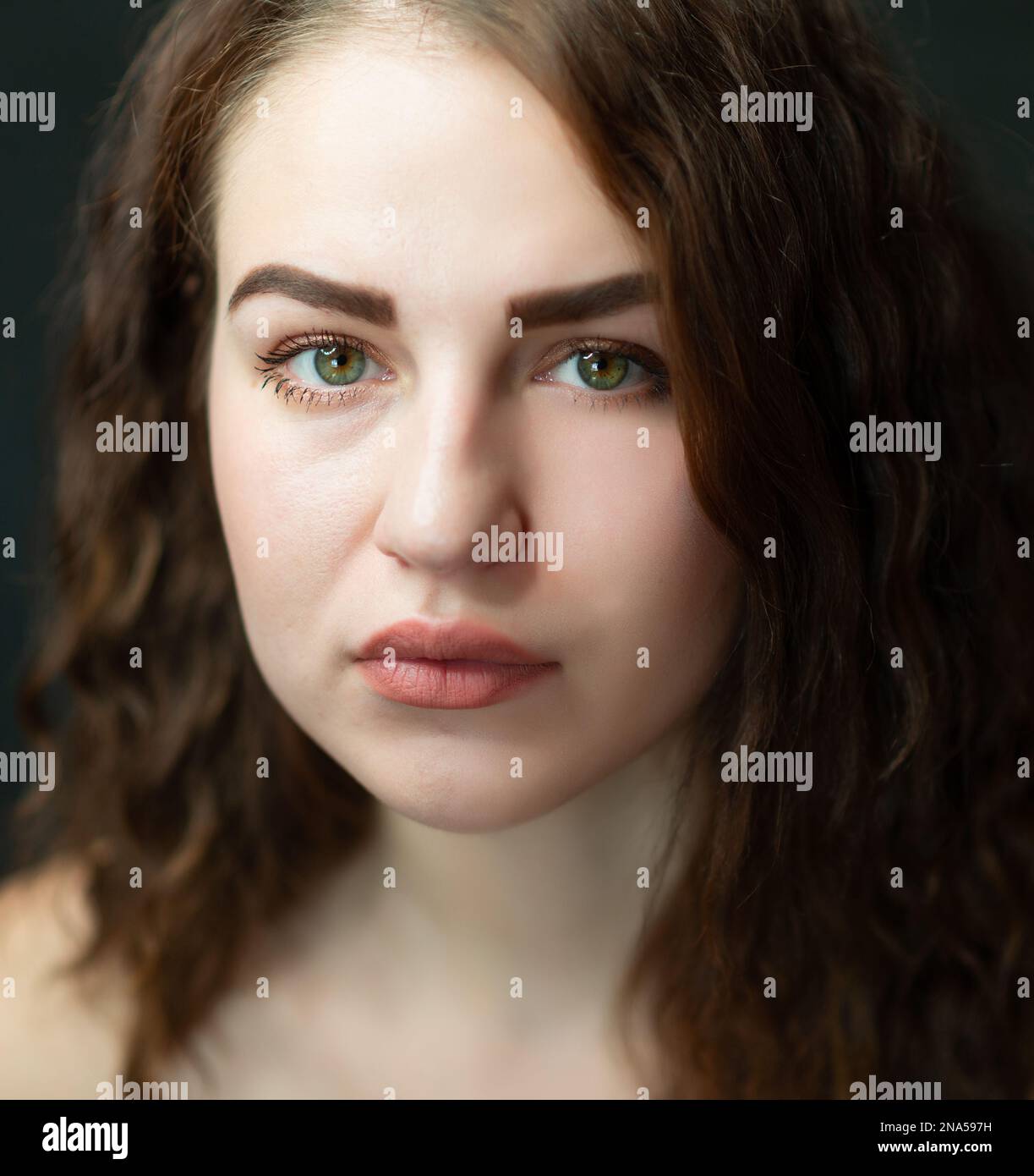 Beauty concept - retouch before and after. Beautiful woman with green ...