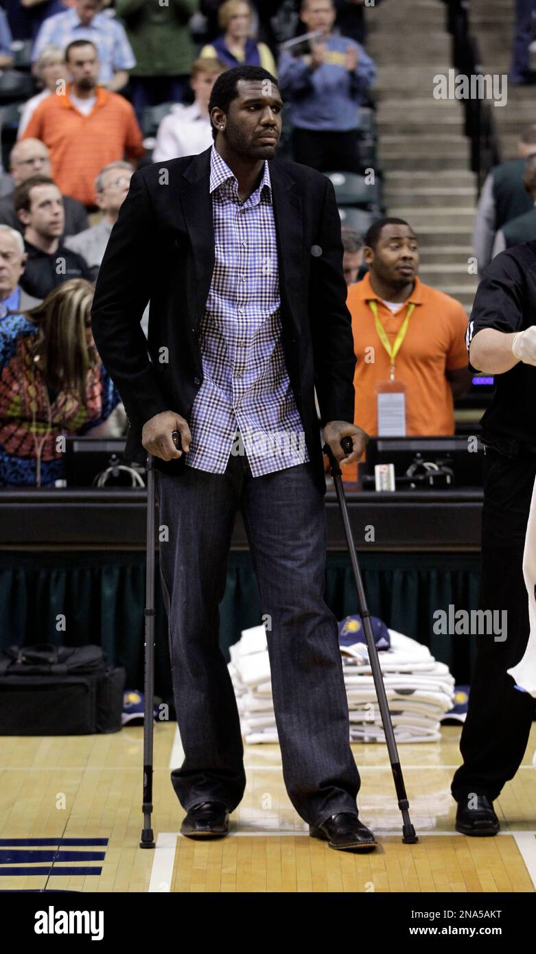 Injured Trail Blazers' Greg Oden listen to theNational Anthem before ...