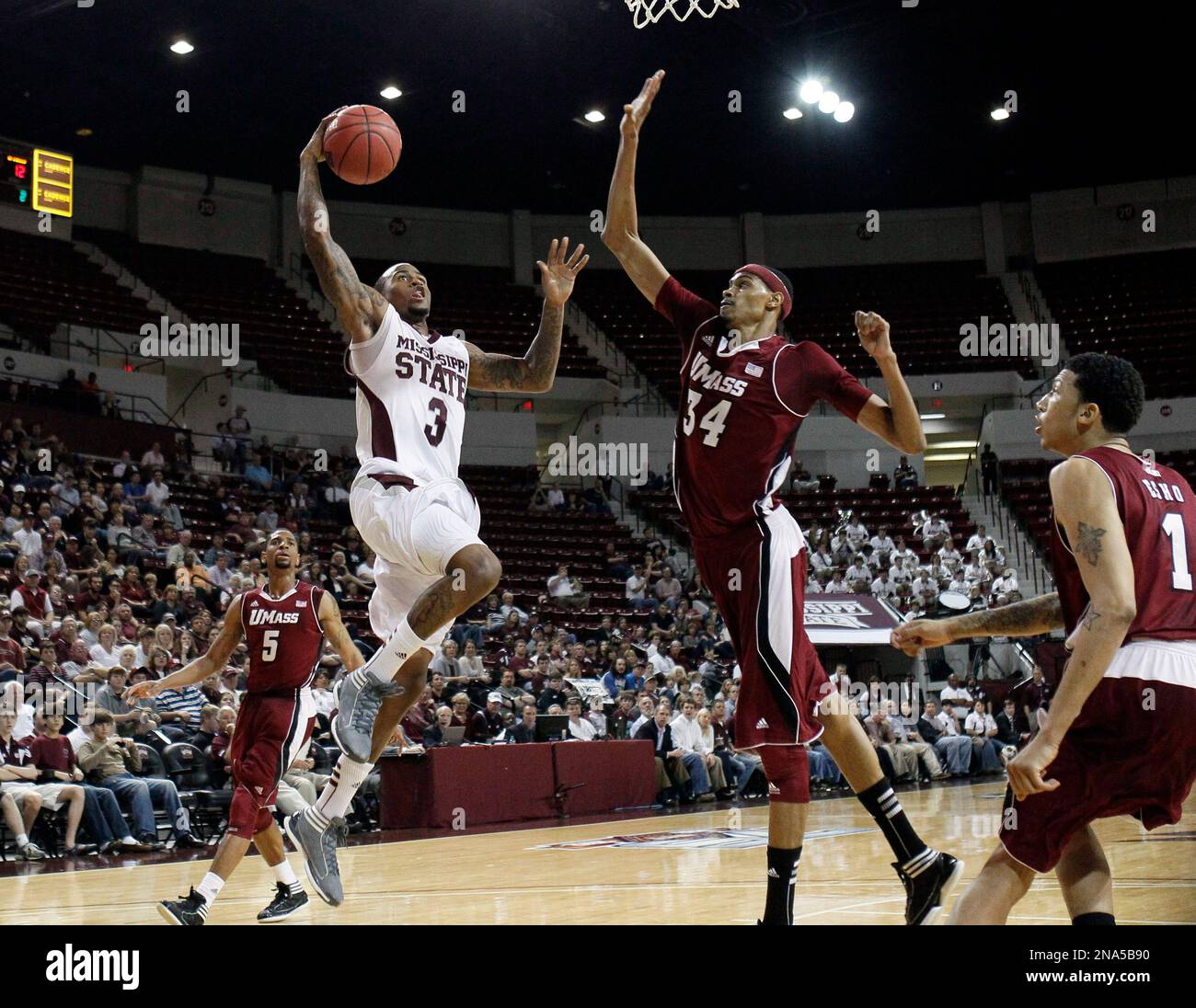 Mississippi State guard Dee Bost (3) shoots againt Massachusetts ...