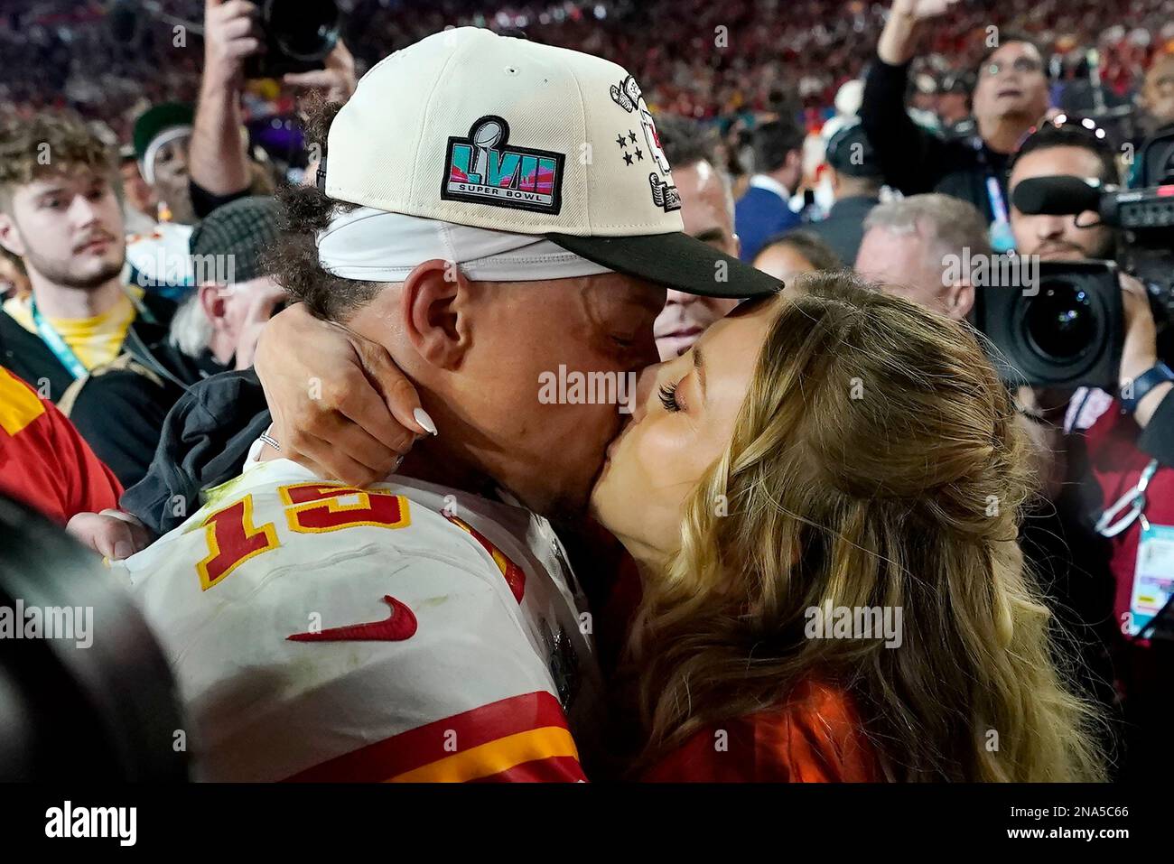Kansas City Chiefs quarterback Patrick Mahomes kisses his wife, Brittany, after the NFL Super ...
