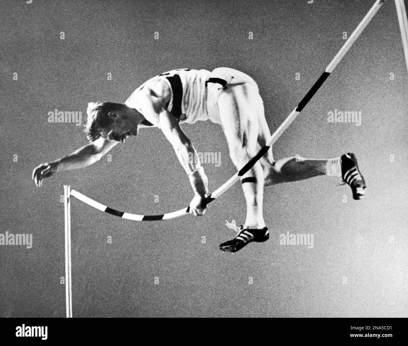 German athlete Wolfgang Reinhardt clears the bar to win the silver ...