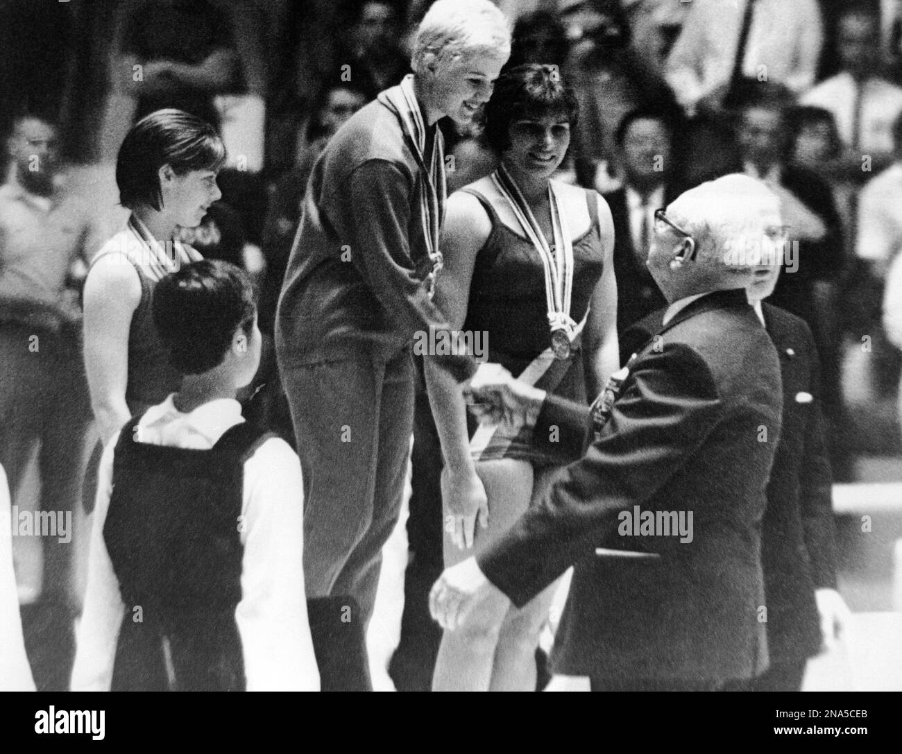 German athlete Ingrid Engel-Kraemer is congratulated after receiving ...