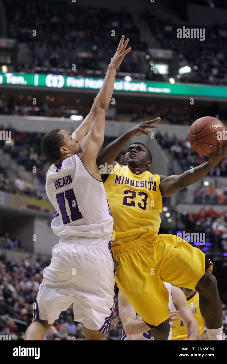 Minnesota guard Chip Armelin (23) goes up for a basket against ...