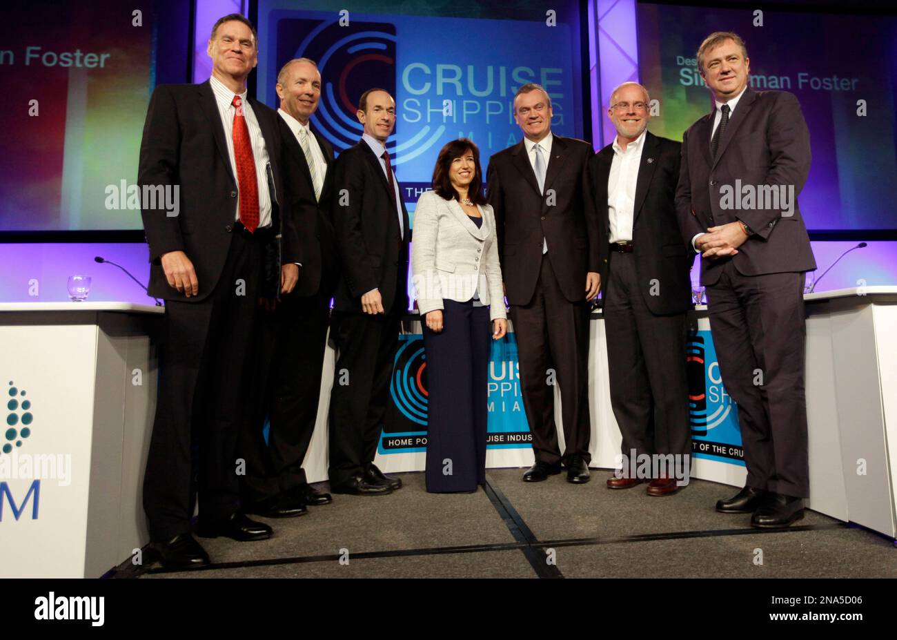 Posing for a group photo following a roundtable discussion on the state ...