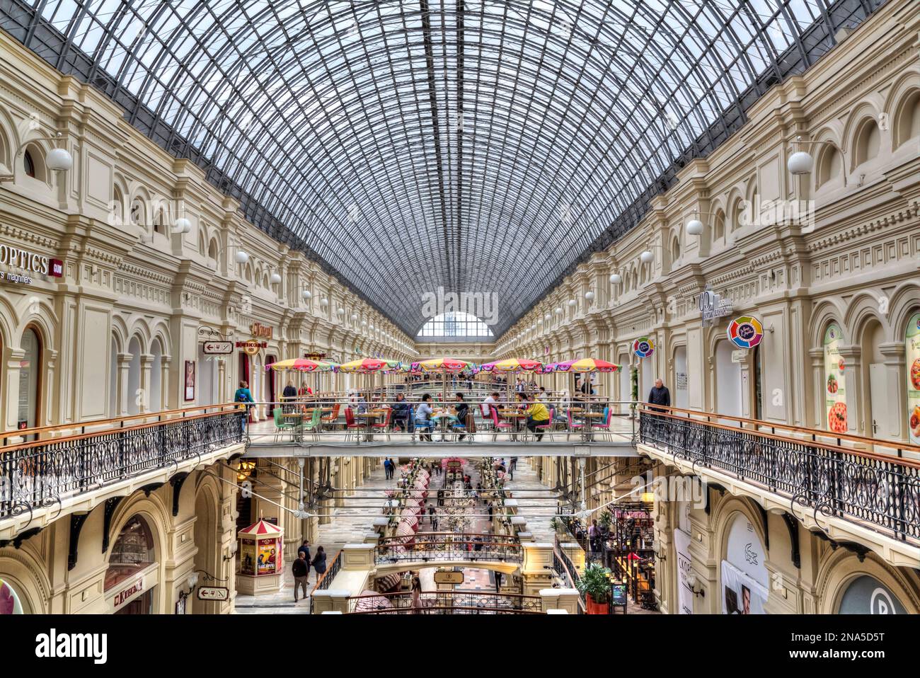 GUM Shopping Mall with a curved ceiling of windows; Moscow, Russia ...