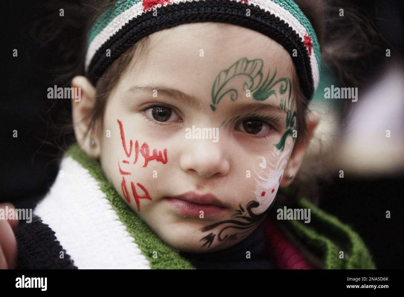 A Syrian girl living in Yemen with colours of the Syrian revolutionary ...