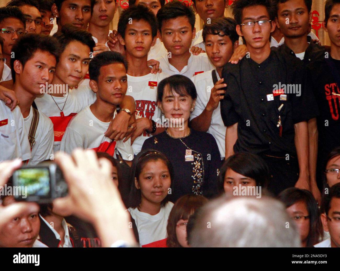 Myanmar's democracy leader Aung San Suu Kyi, center, poses for photo ...