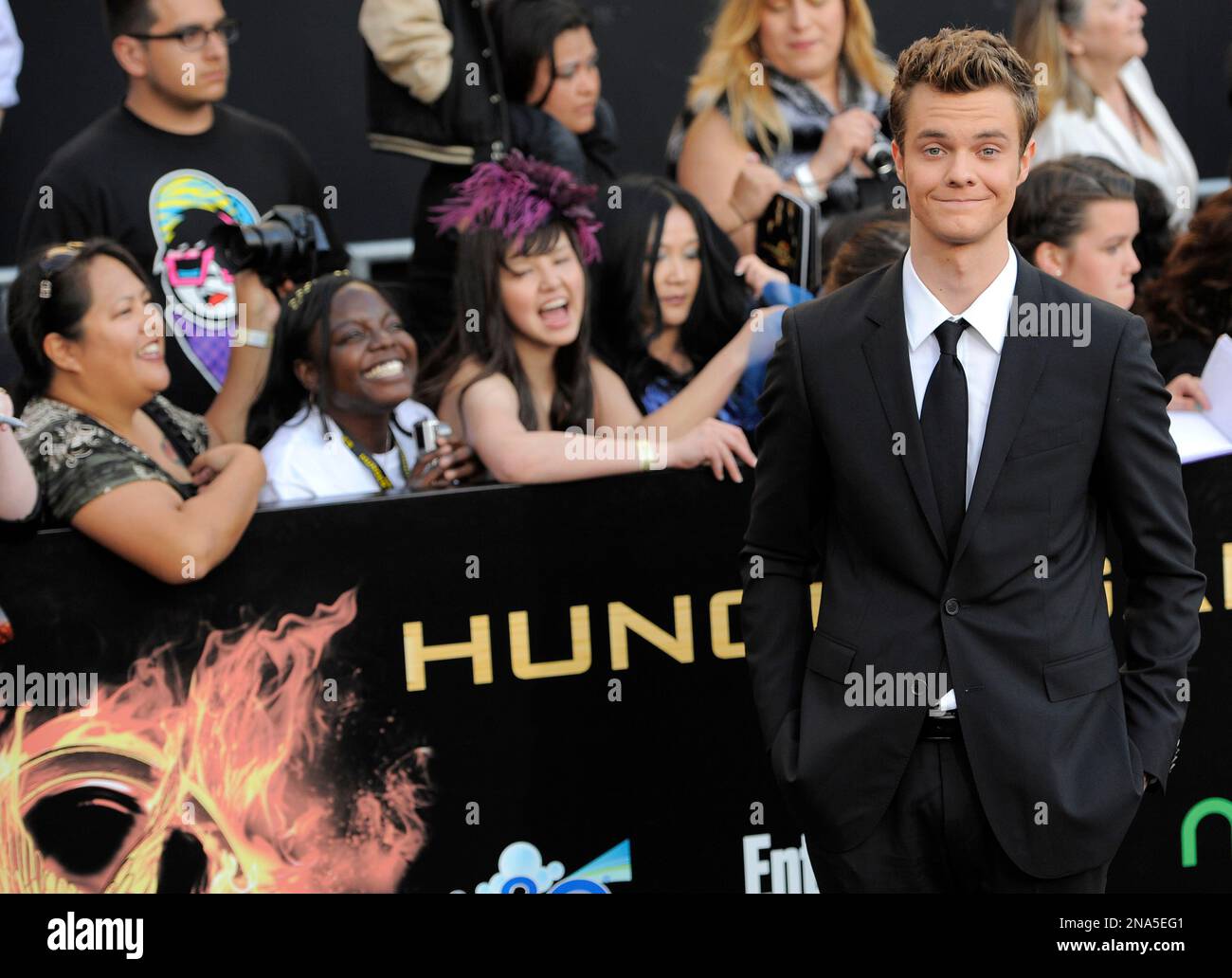 Jack Quaid arrives at the world premiere of "The Hunger Games" on ...