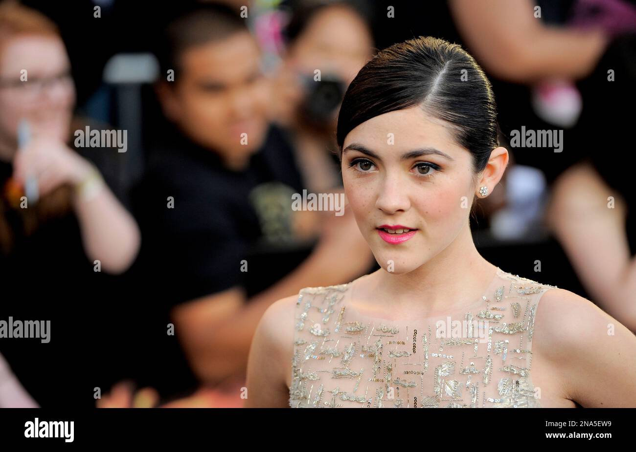 Isabelle Fuhrman arrives at the world premiere of "The Hunger Games" on Monday March 12, 2012 in ...