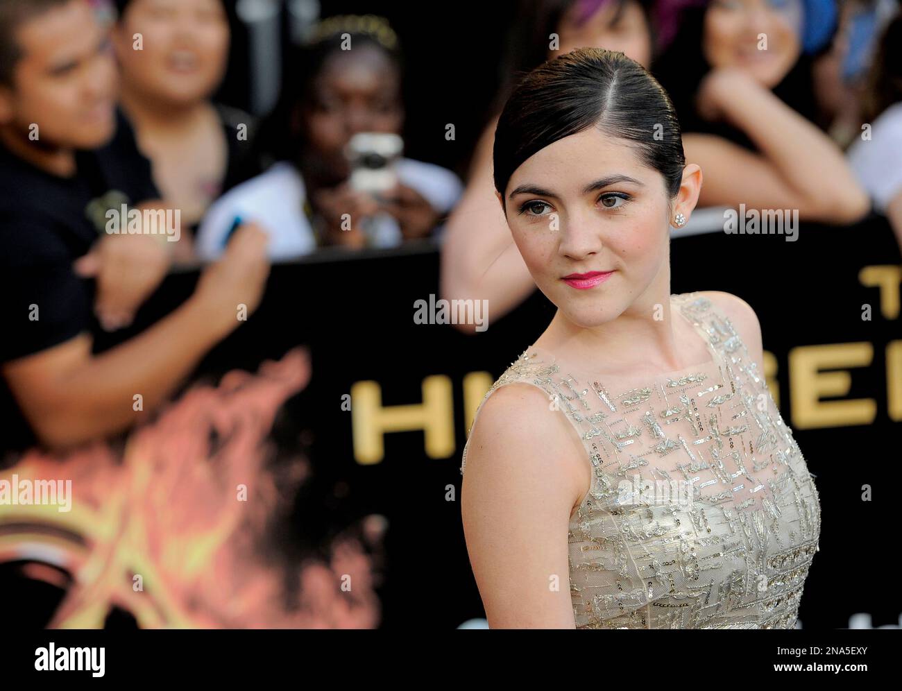 Isabelle Fuhrman arrives at the world premiere of "The Hunger Games" on Monday March 12, 2012 in ...