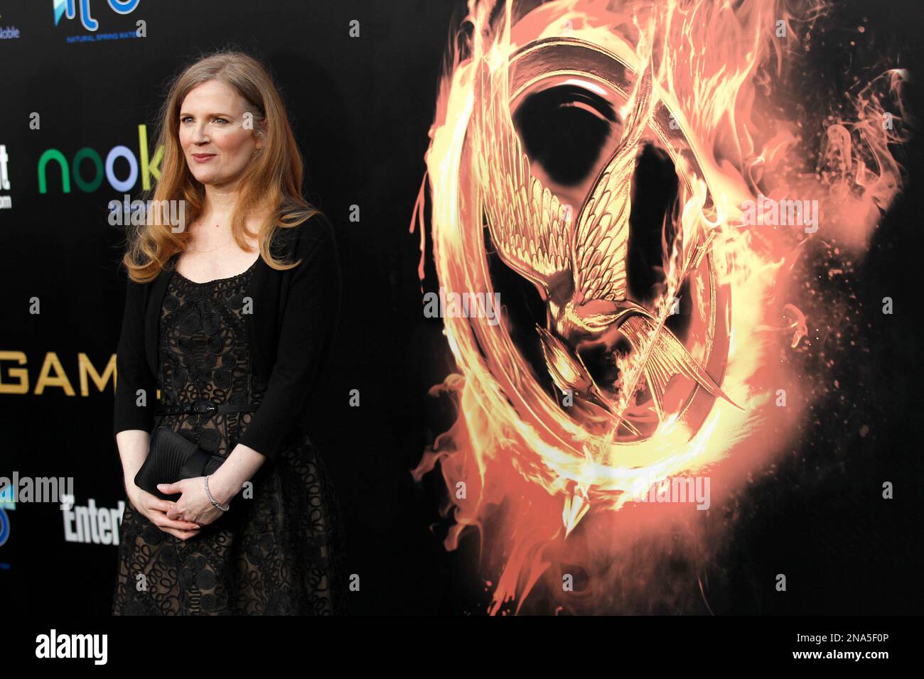 Suzanne Collins arrives at the world premiere of "The Hunger Games" on ...