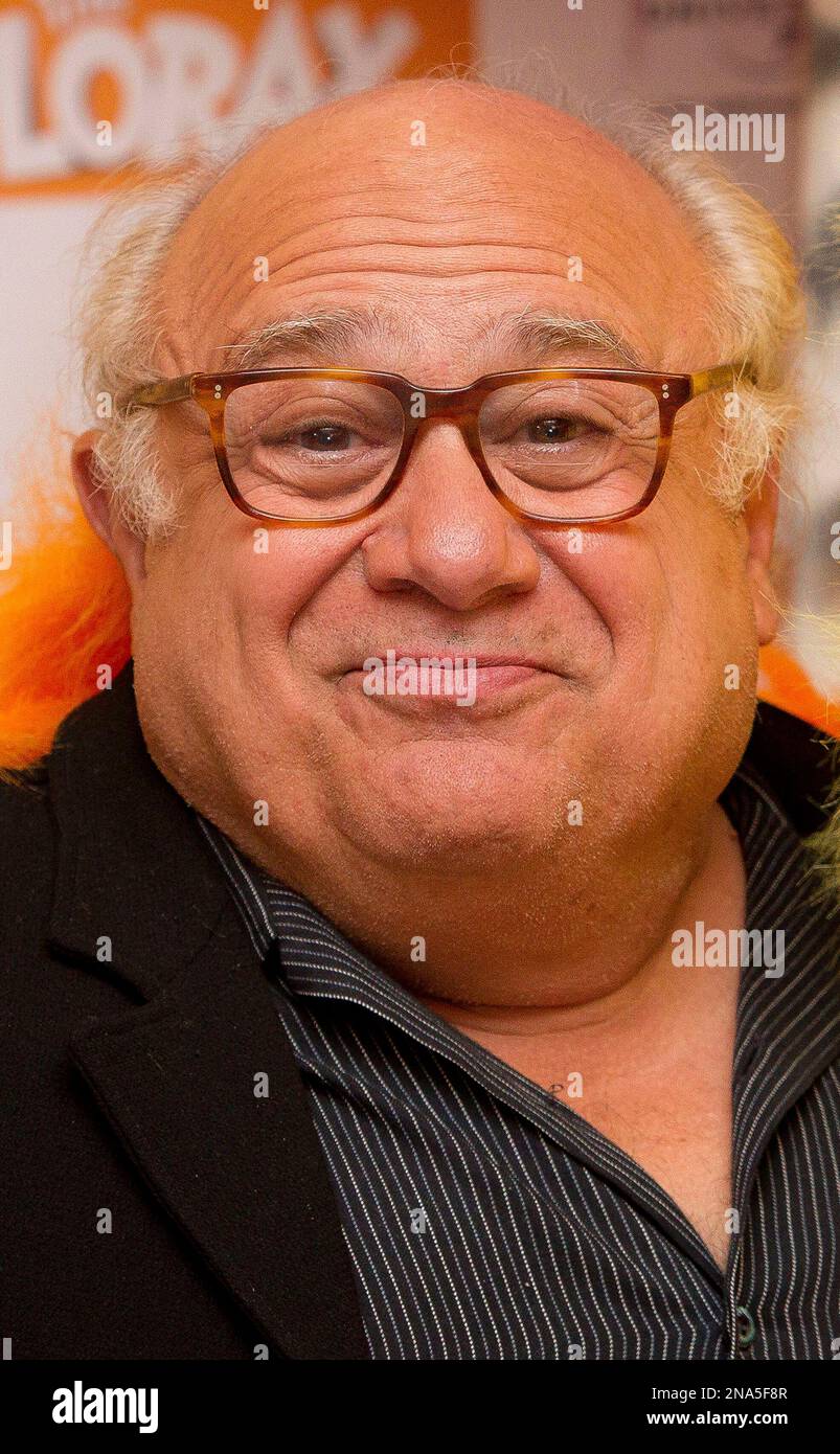 U.S actor Danny DeVito waves during a photocall for the film, The Lorax ...