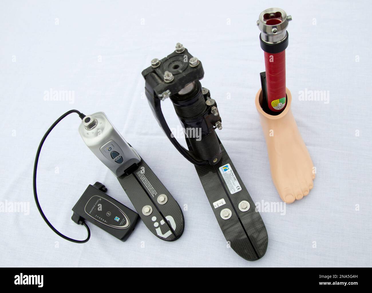 From left, the microprocessor controlled ankle/foot prosthetic, shock ...