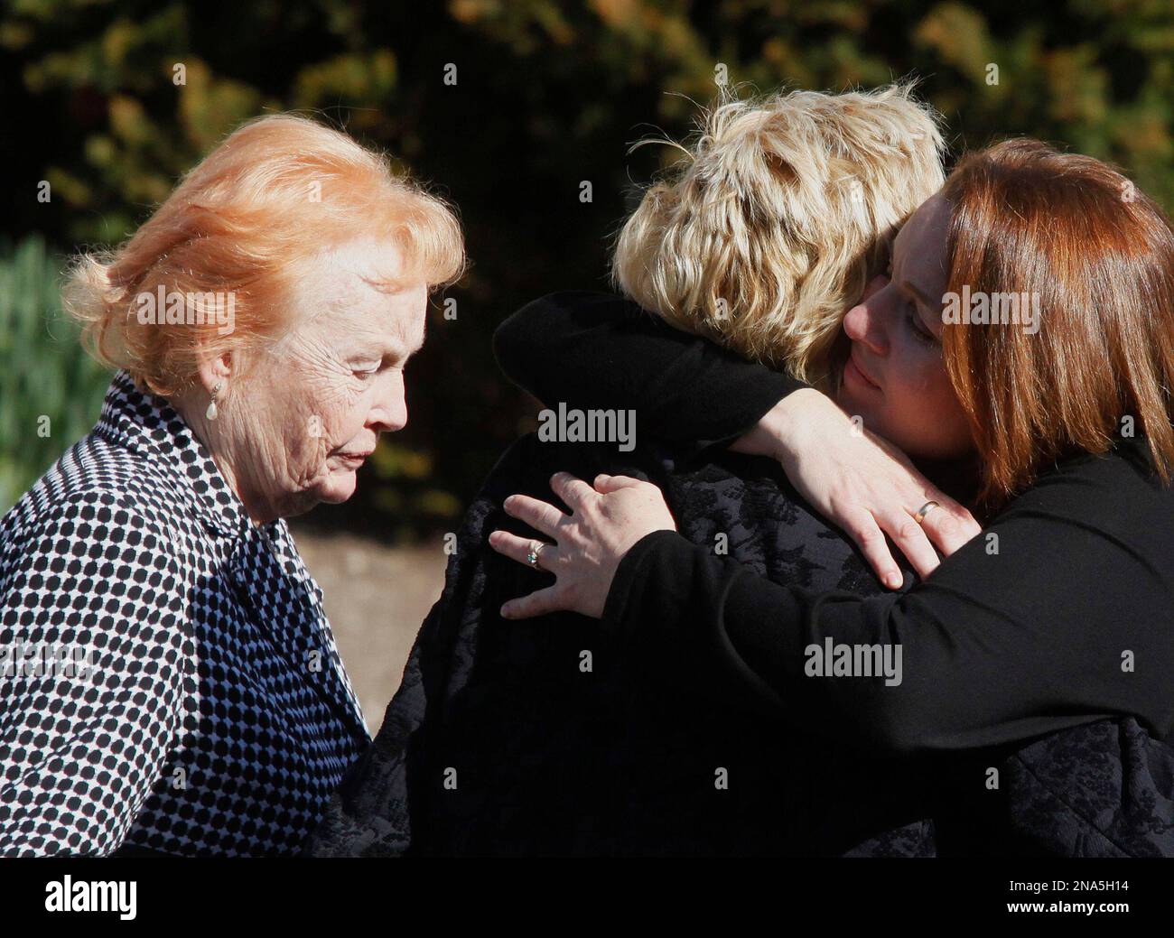 Rosemarie Colvin, left, arrives for the funeral service for her ...