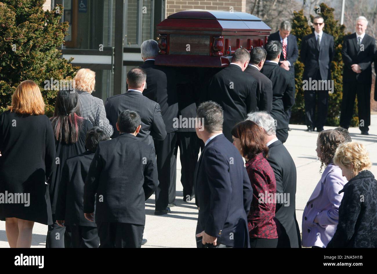 Mourners follow Marie Colvin's casket into St. Dominic Roman Catholic ...