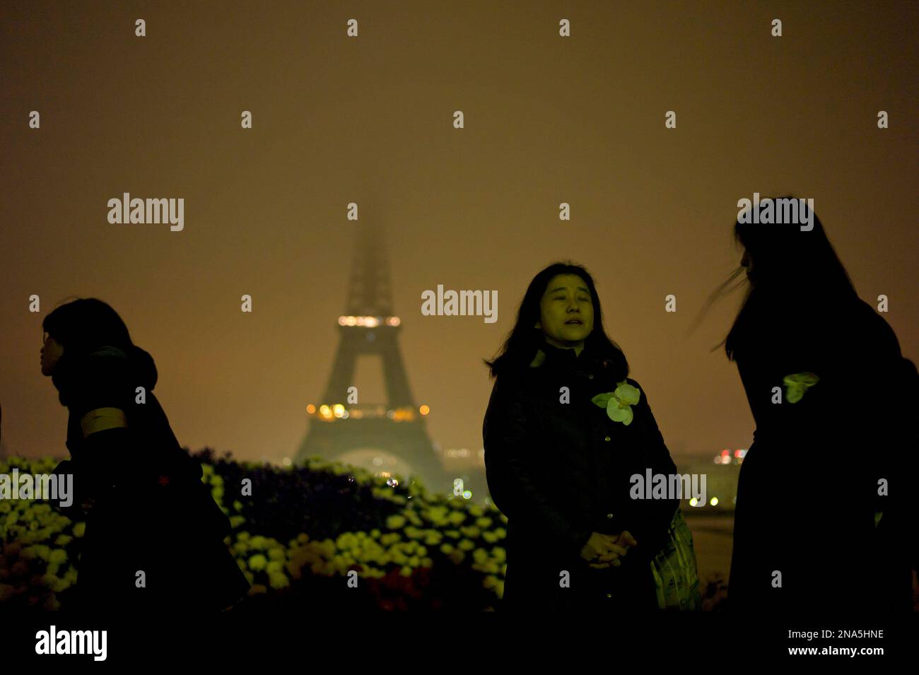 People gather to mark the anniversary of the March 11, 2011 earthquake ...