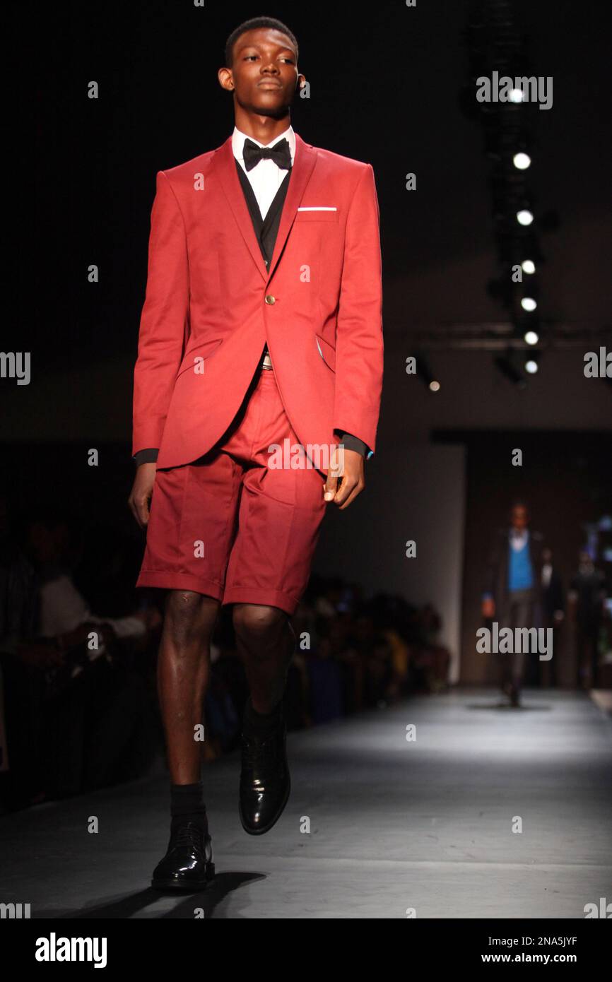 A model displays an outfit by designer Ozwald Boateng of the United ...