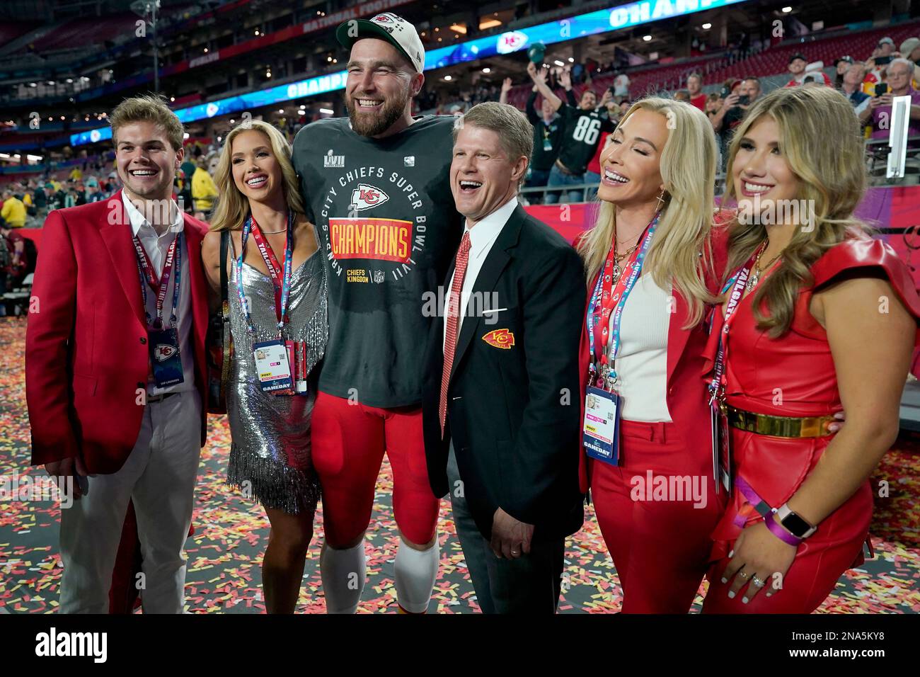 Kansas City Chiefs owner Clark Hunt, center right, poses with his ...