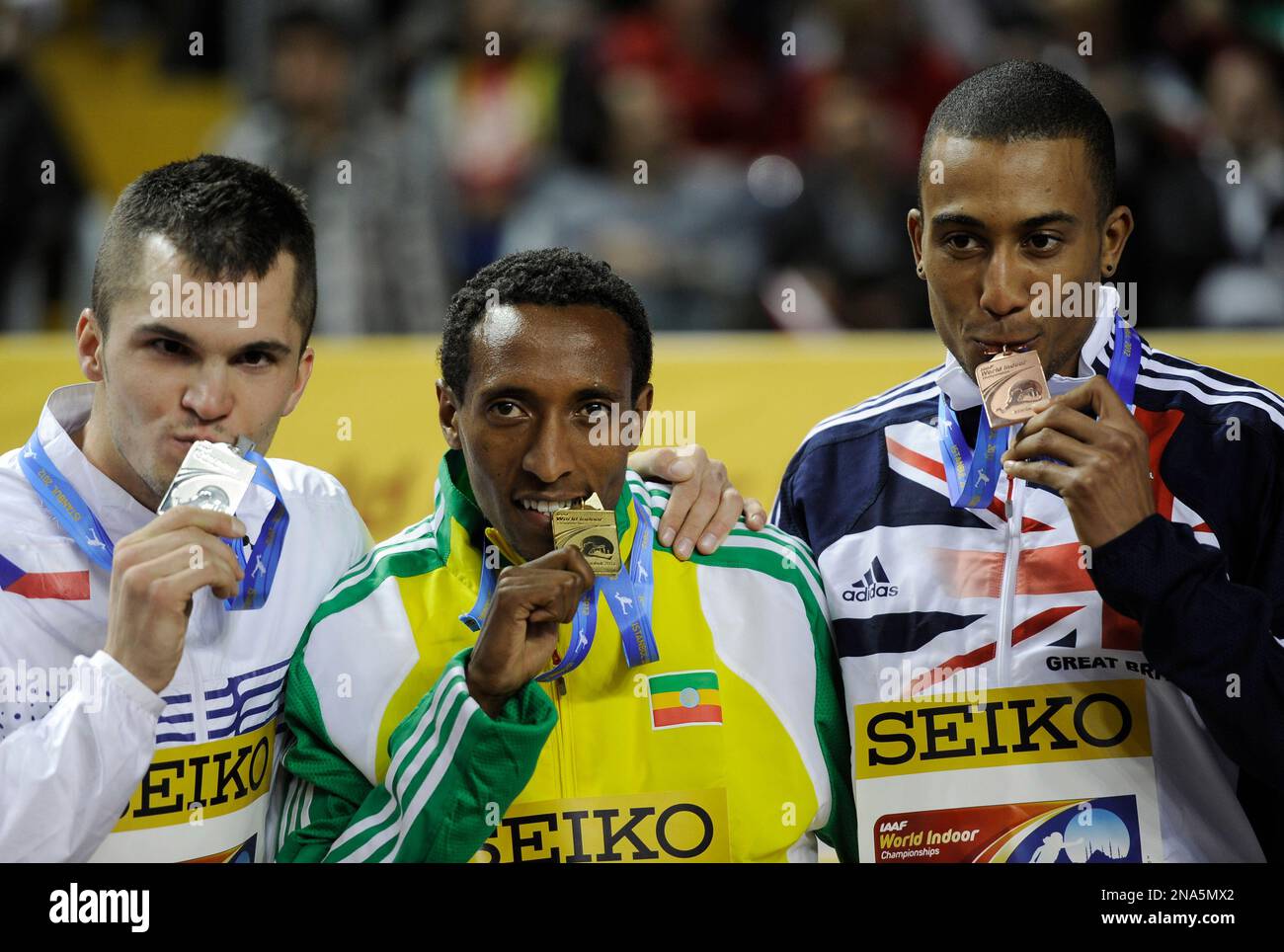 Ethiopia's gold medal winner Mohammed Aman is flanked by Czech Republic ...