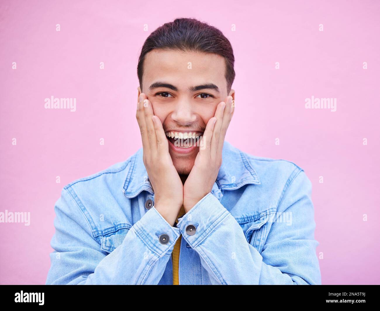 Man, hands and cheeks for surprise in portrait with happiness, excited ...