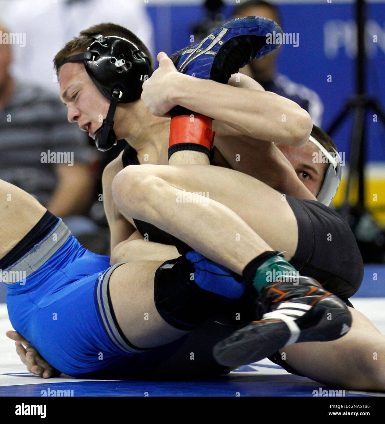 Bethlehem Catholic's Randy Cruz, top left, battles Reynolds' Dylan D ...