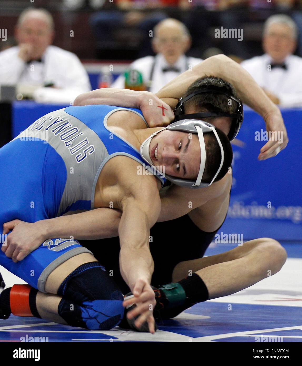 Bethlehem Catholic's Randy Cruz, back right, battles Reynolds' Dylan D ...