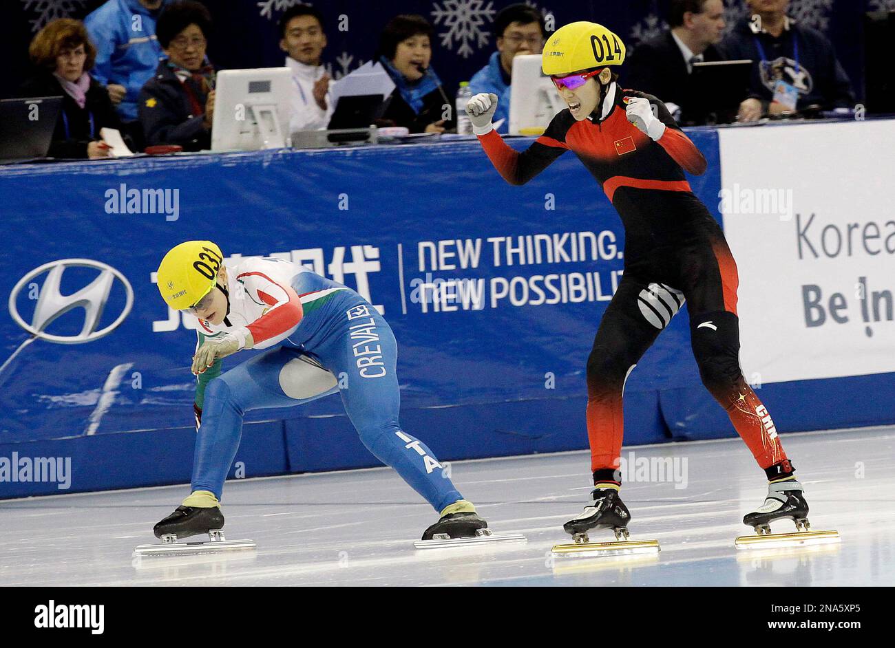 Fan Kexin of China, right, celebrates her victory after she crossed the ...