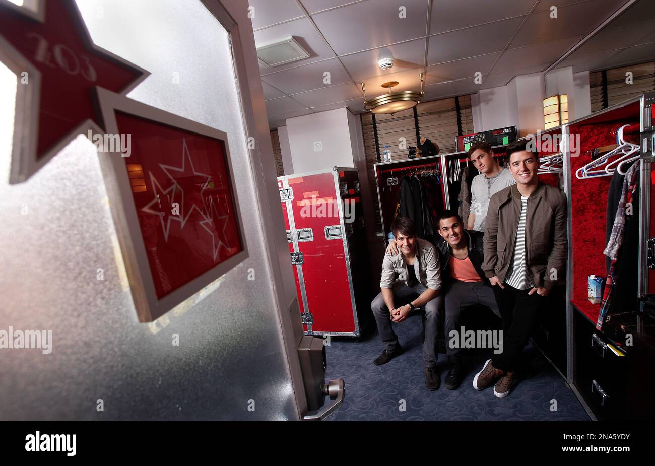 The boy band Big Time Rush pose for a portrait in their dressing room ...