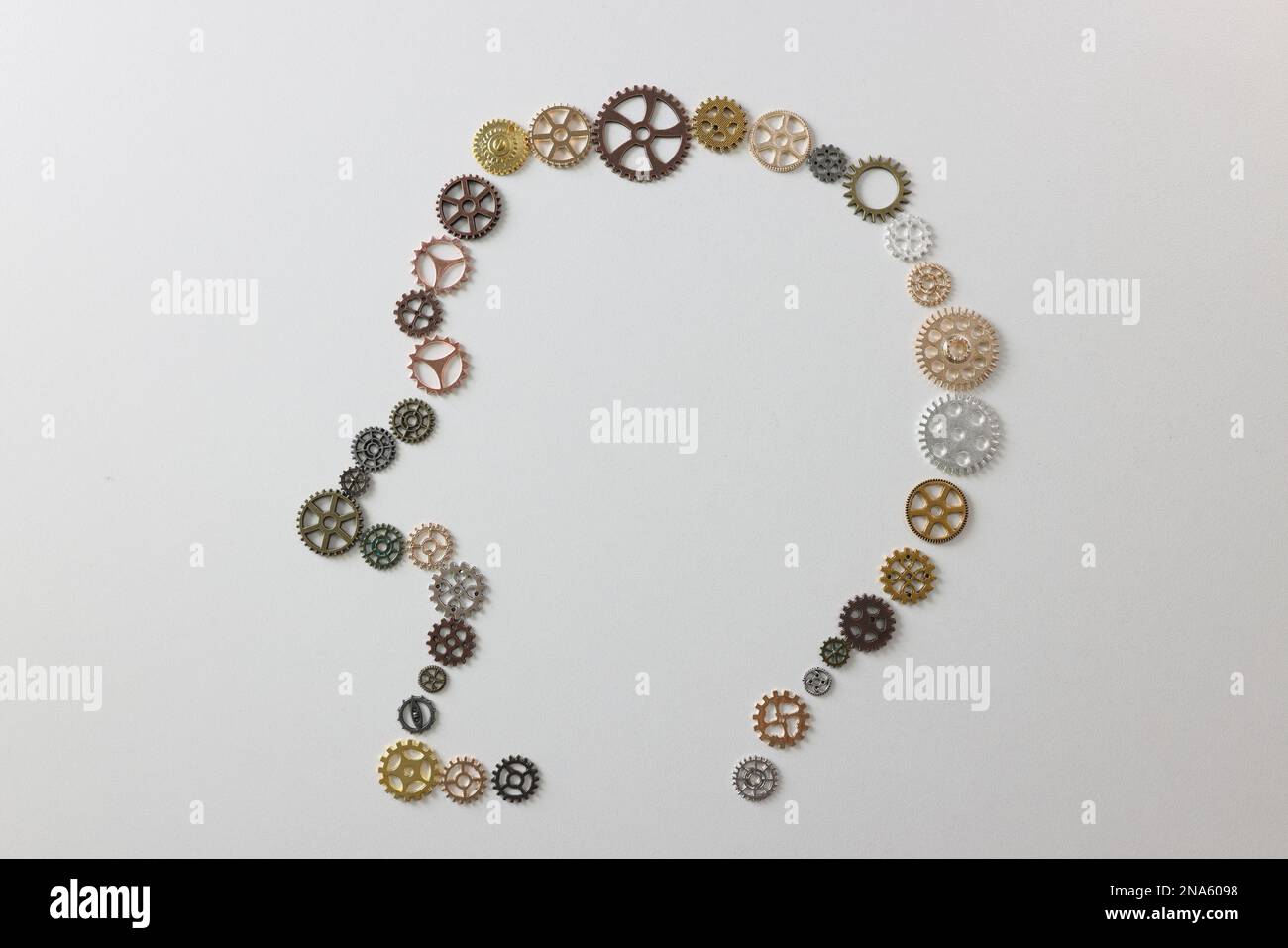 Many different gears shaped as human head on white background Stock ...