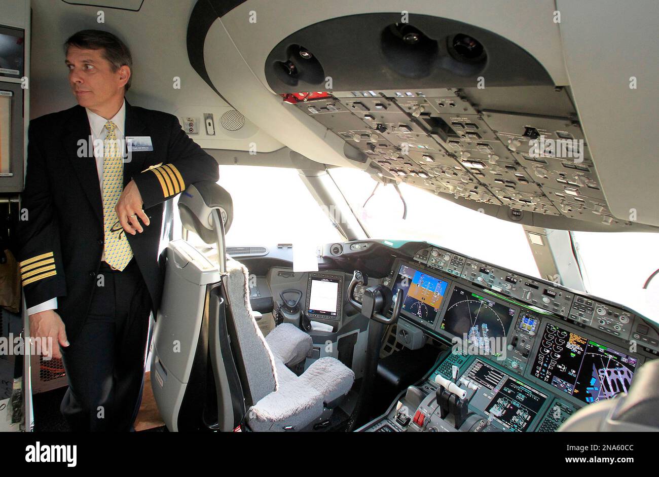 Capt. Ed Wilson, a Boeing 787 test pilot, stands in the cockpit of a ...
