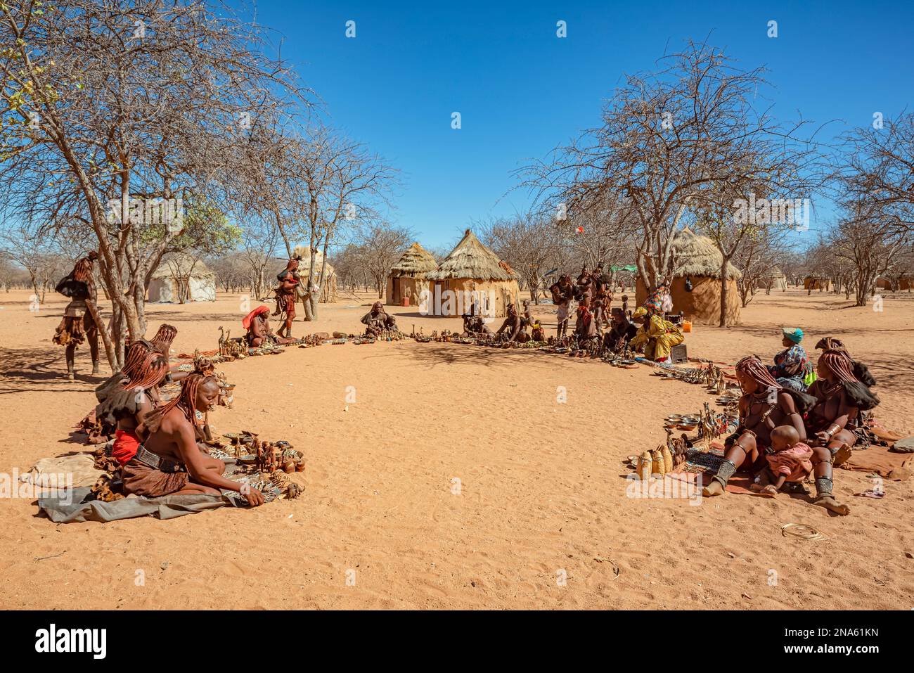 Himba women selling crafts; Himba village, Kamanjab, Namibia Stock ...
