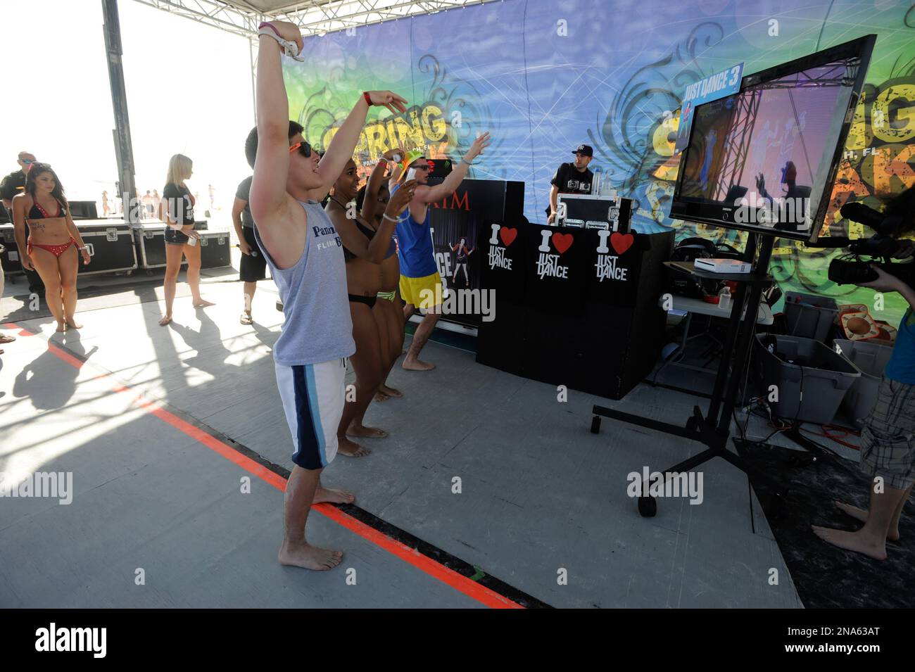 Katrina Bowden watches as contestants dance to Just Dance 3 at the ...