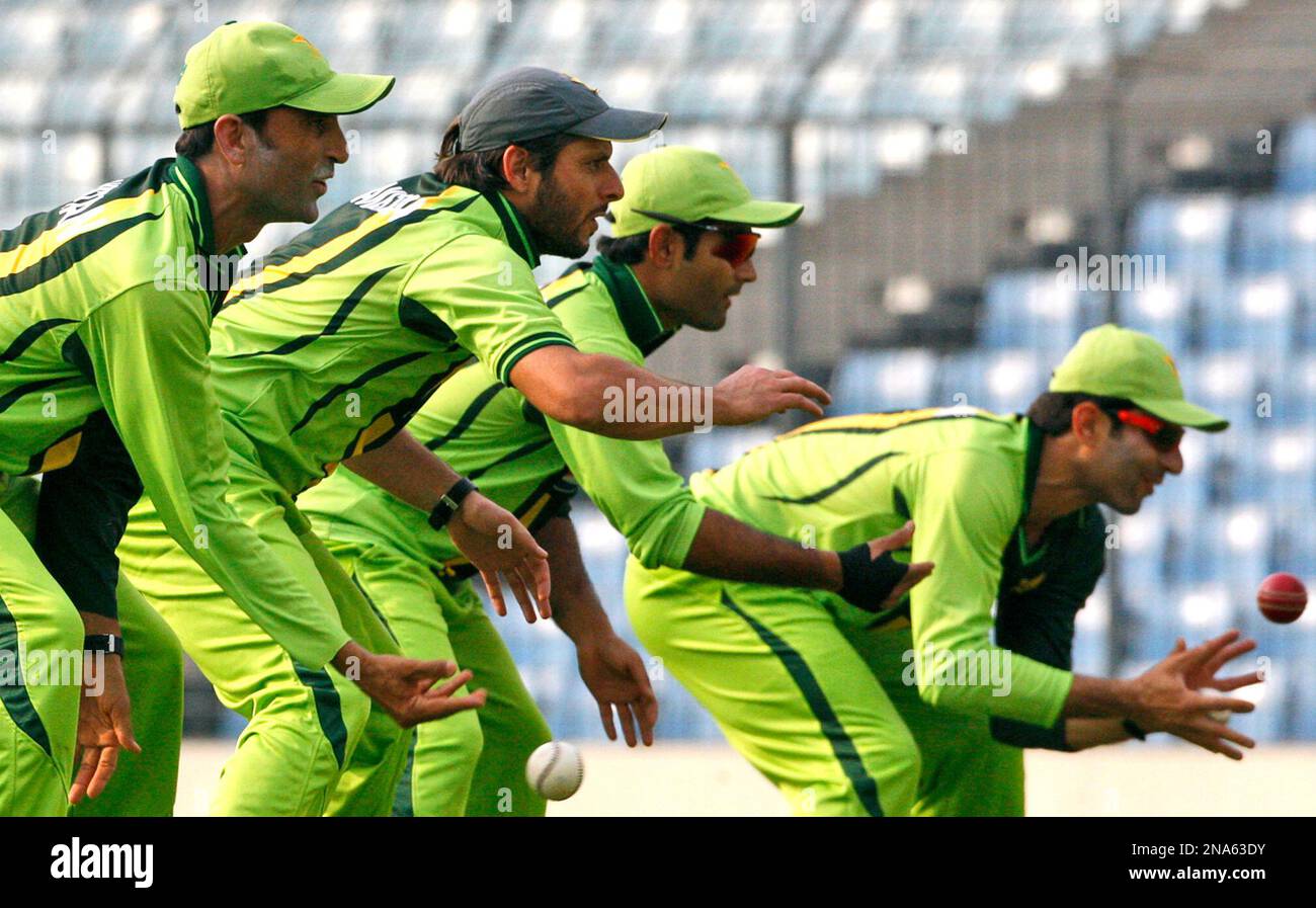 Pakistan's cricketer Shahid Afridi, second left, and teammates practice ...