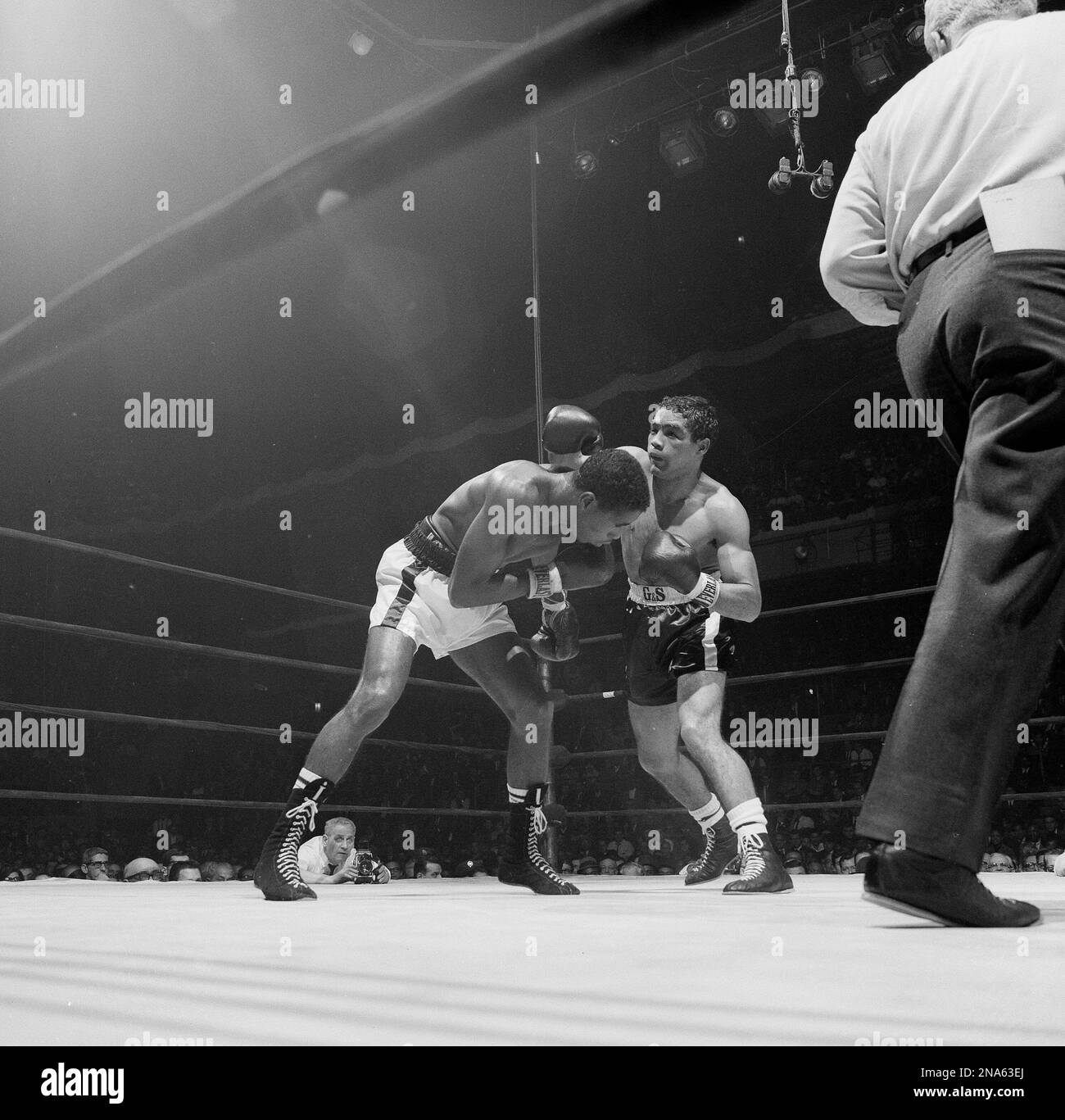 Puerto Rican boxer Frankie Narvaez, right, slams a right to the chin of ...