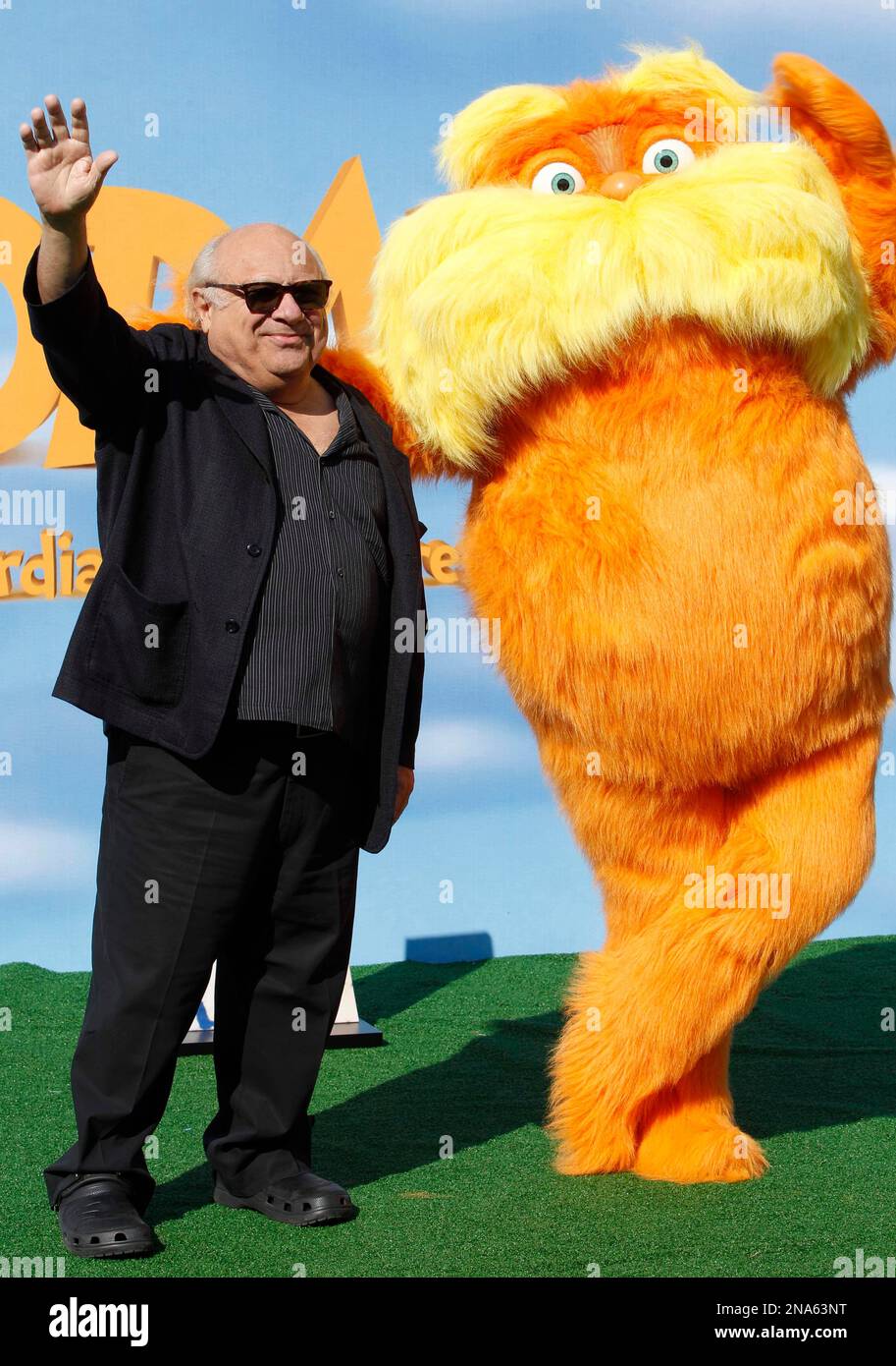 American actor Danny DeVito gestures next to the Lorax, during the ...