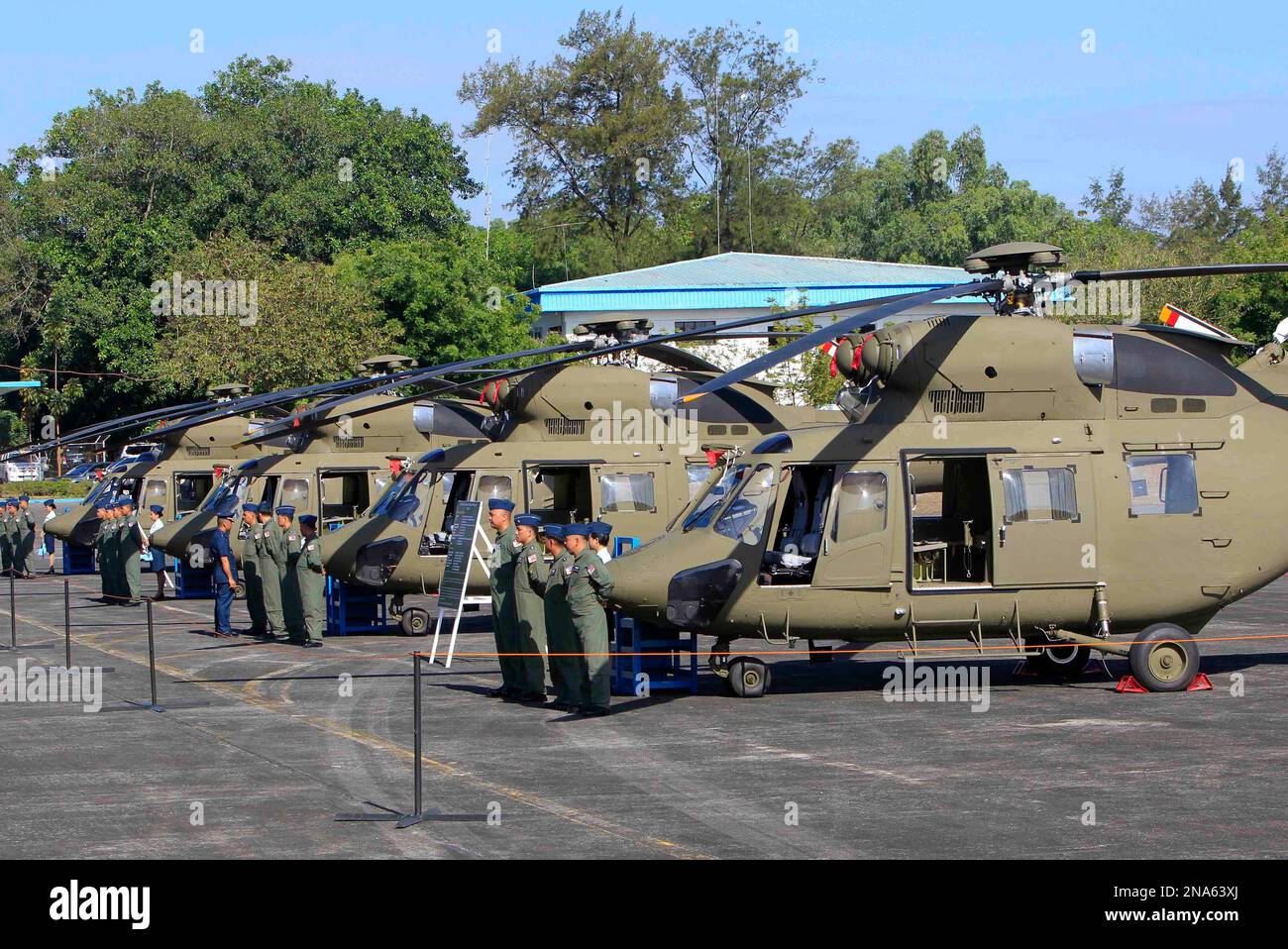 Philippine Air Force officers and crew stand at attention during turnover ceremony for brand new ...