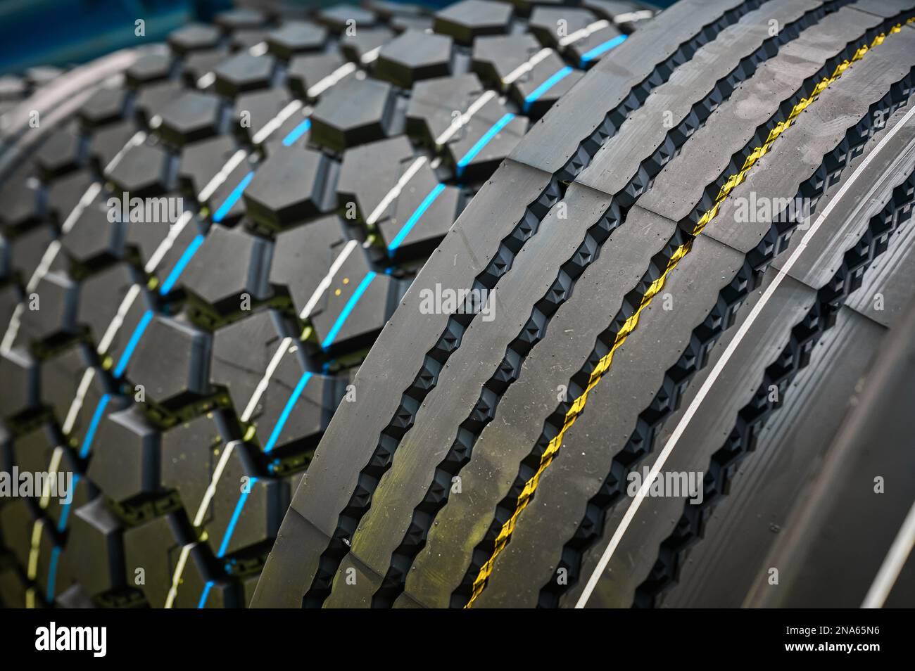 Tyres with white and blue markings with different types of tread Stock ...