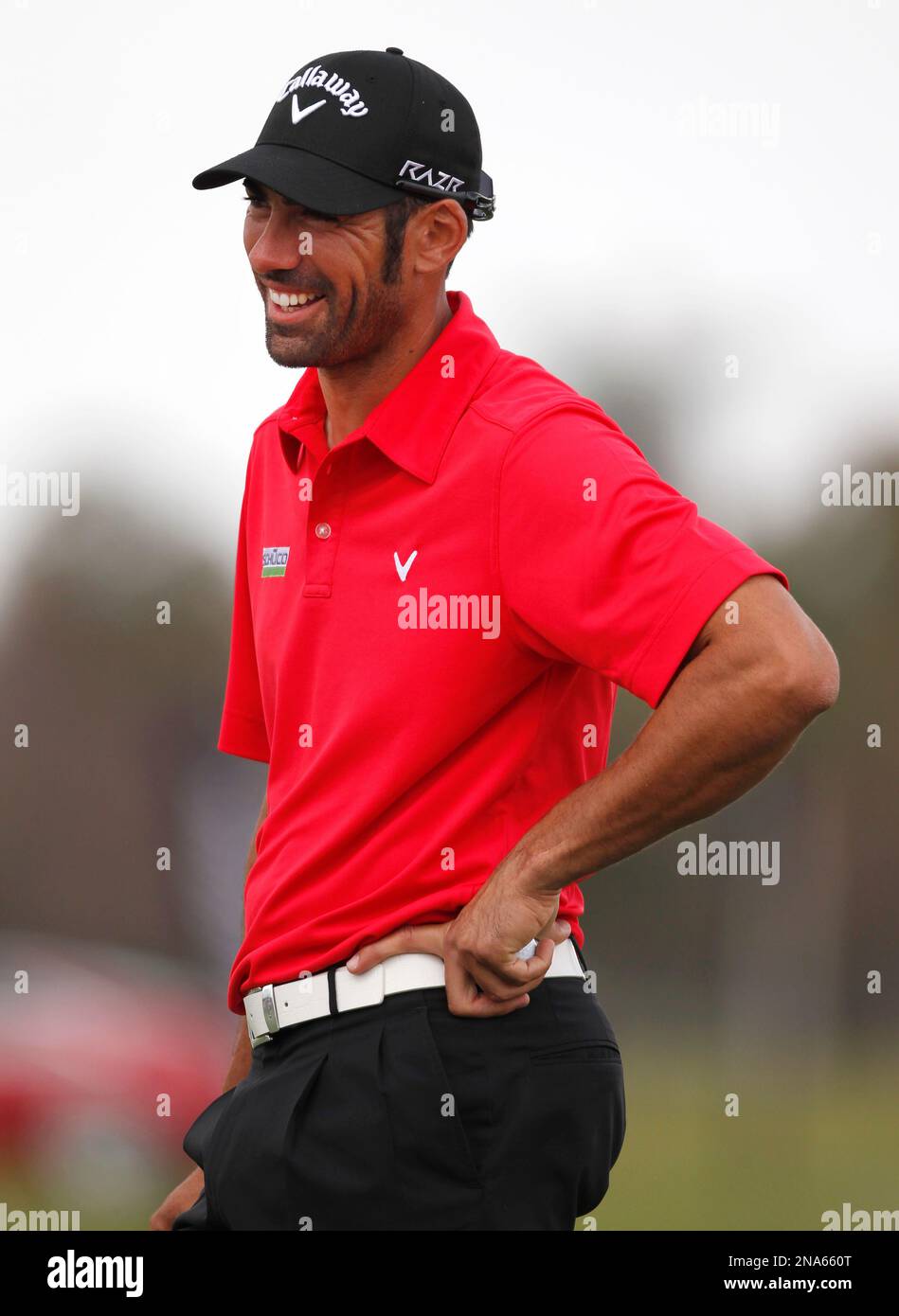 Alvaro Quiros, of Spain, waits to putt on the ninth hole during the ...
