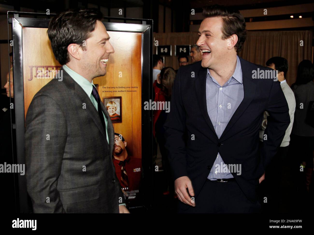 Cast members Jason Segel, right, and Ed Helms laugh together at the ...