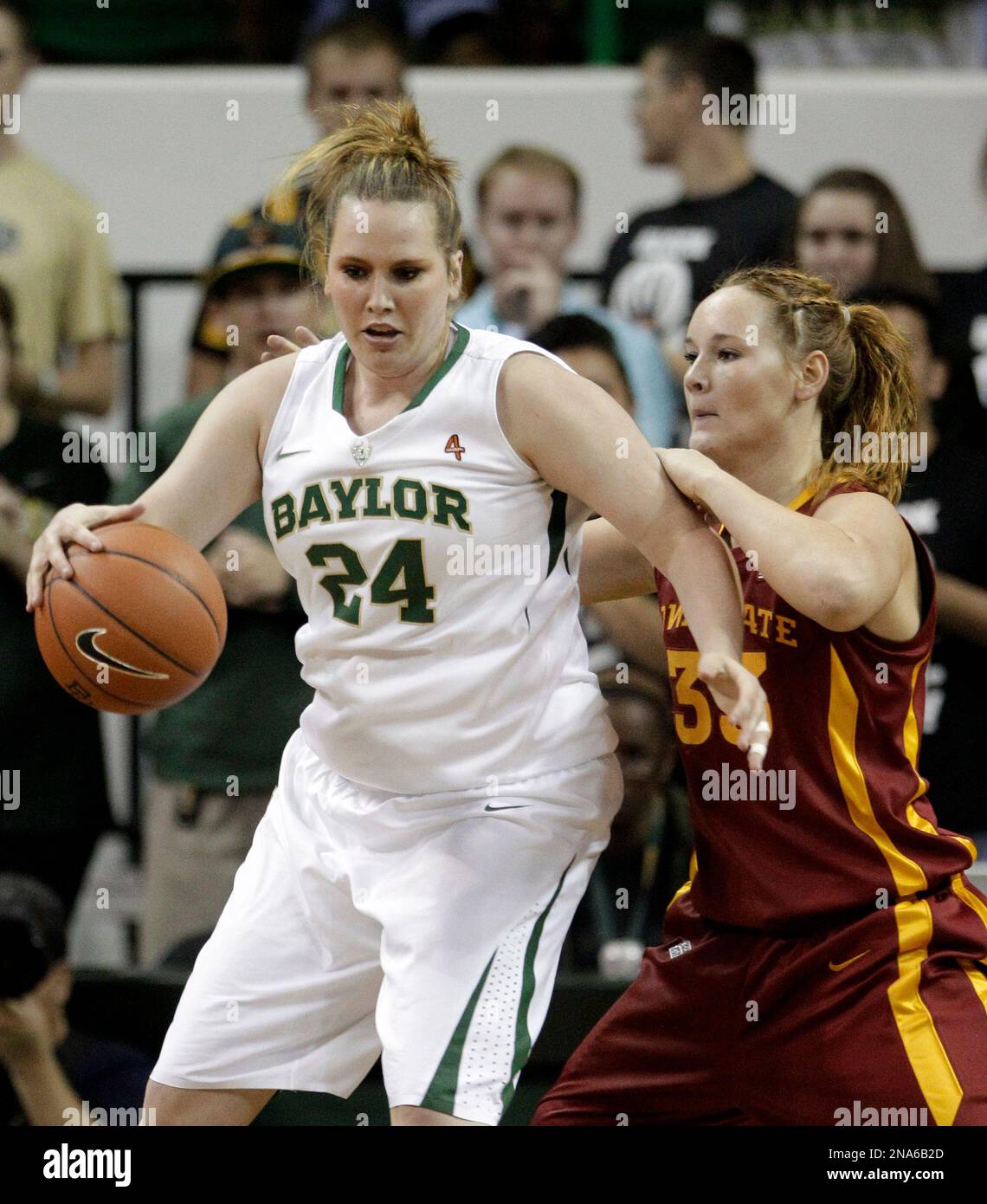 Baylor 's Ashley Field (24) fights for position against Iowa State 's Chelsea Poppens (33 ...