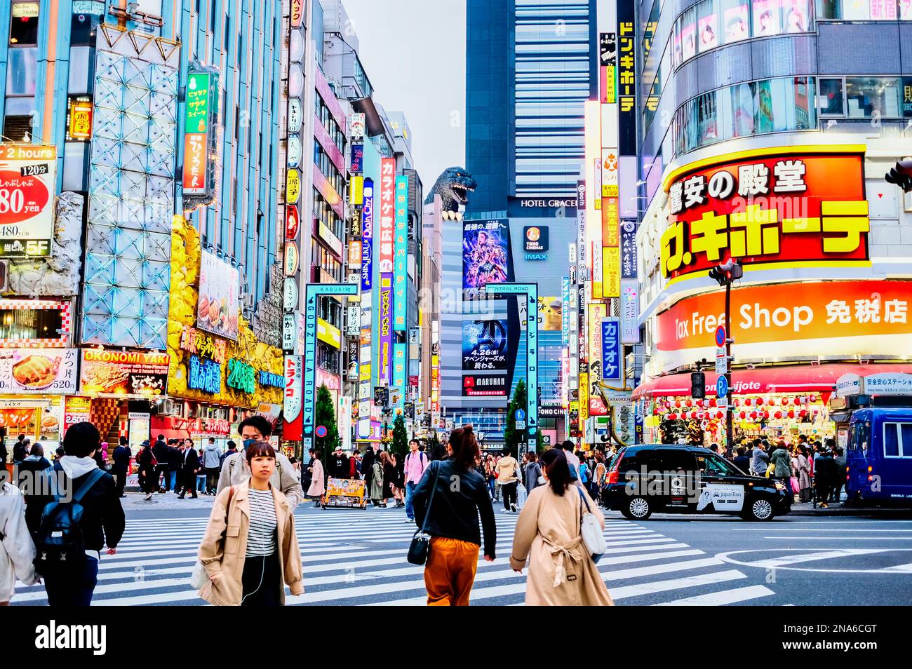 Busy shopping street at dusk in Tokyo; Tokyo, Japan Stock Photo - Alamy