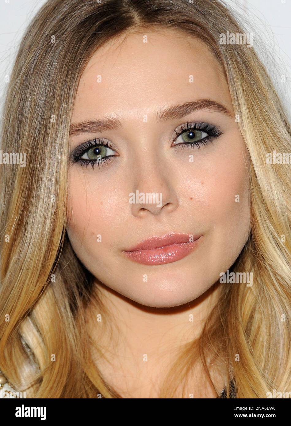 Actress Elizabeth Olsen attends the "Silent House" premiere at the AMC ...