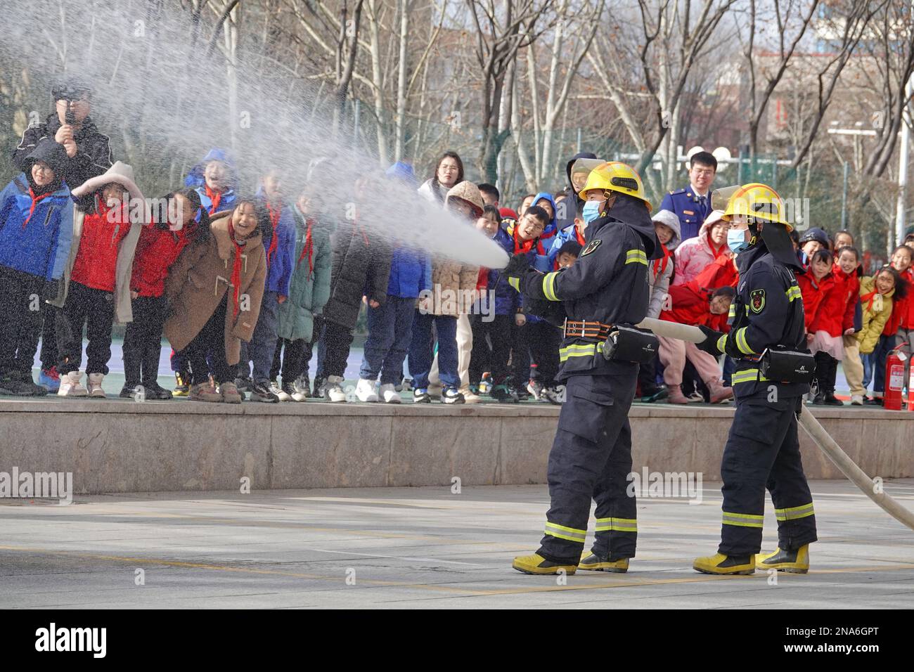 YANTAI, CHINA - FEBRUARY 13, 2023 - Firefighters show fire-fighting ...