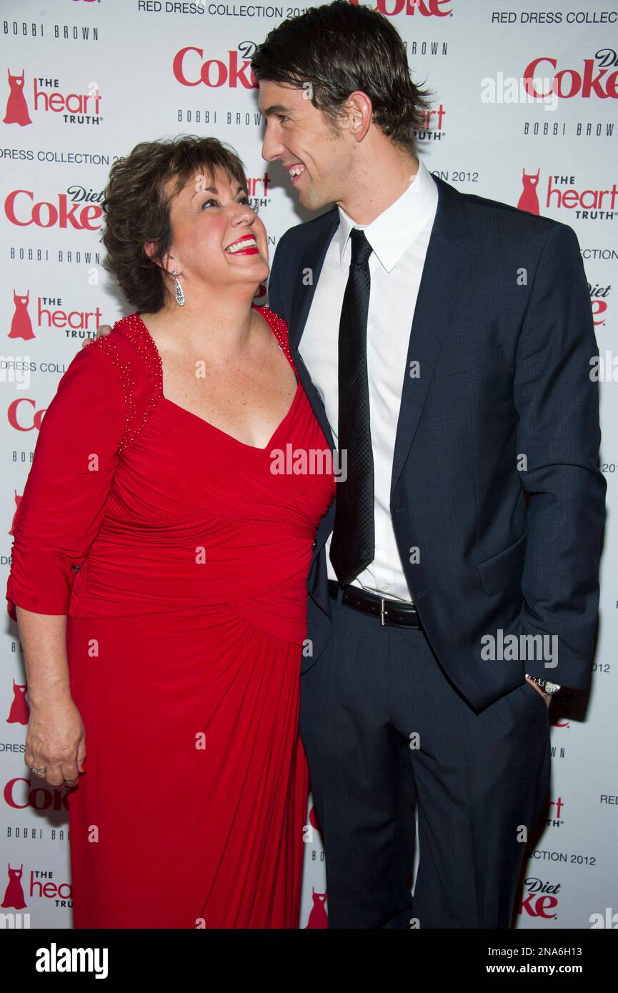 Michael Phelps and his mom Debbie Phelps attend the Heart Truth's Red ...