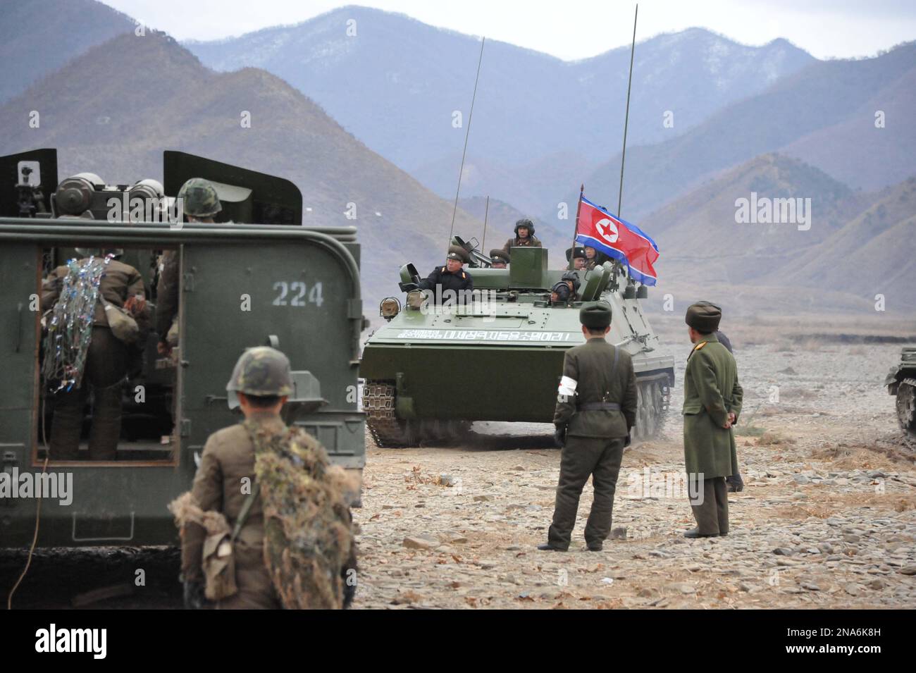 In this March 5, 2012 photo, soldiers ride on an armored personnel ...
