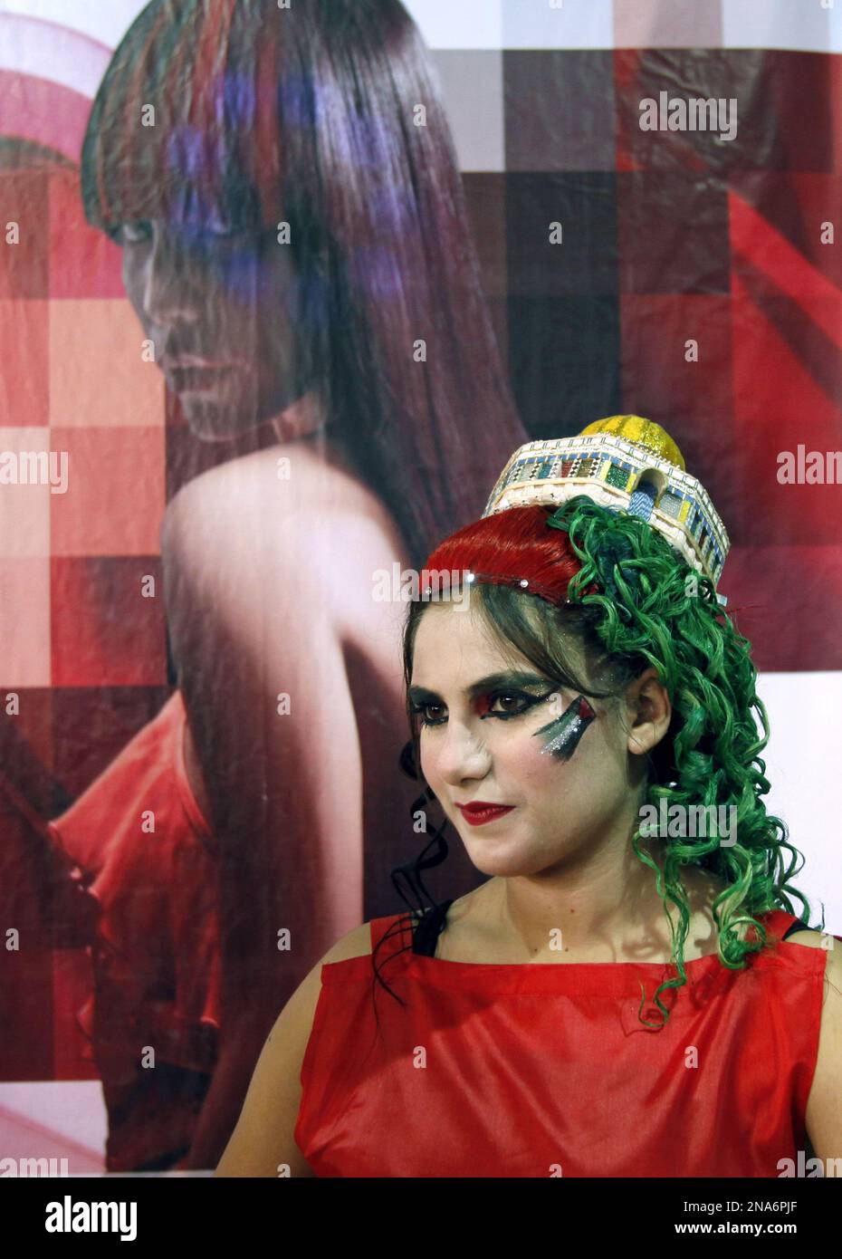 An Israeli Arab model with her hair arranged in the colors of the ...